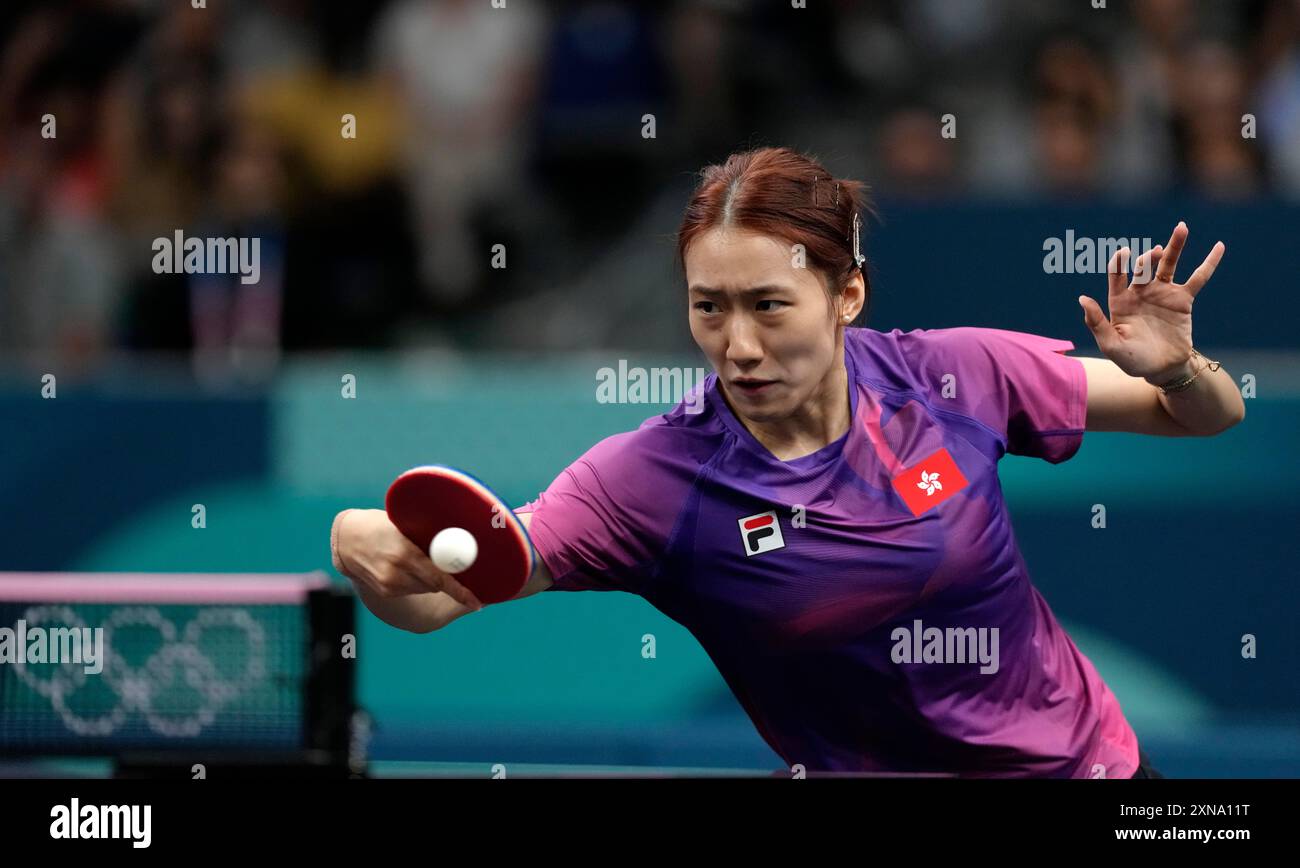 Hong Kong's Zhu Chengzhu plays against Japan's Miu Hirano during a ...