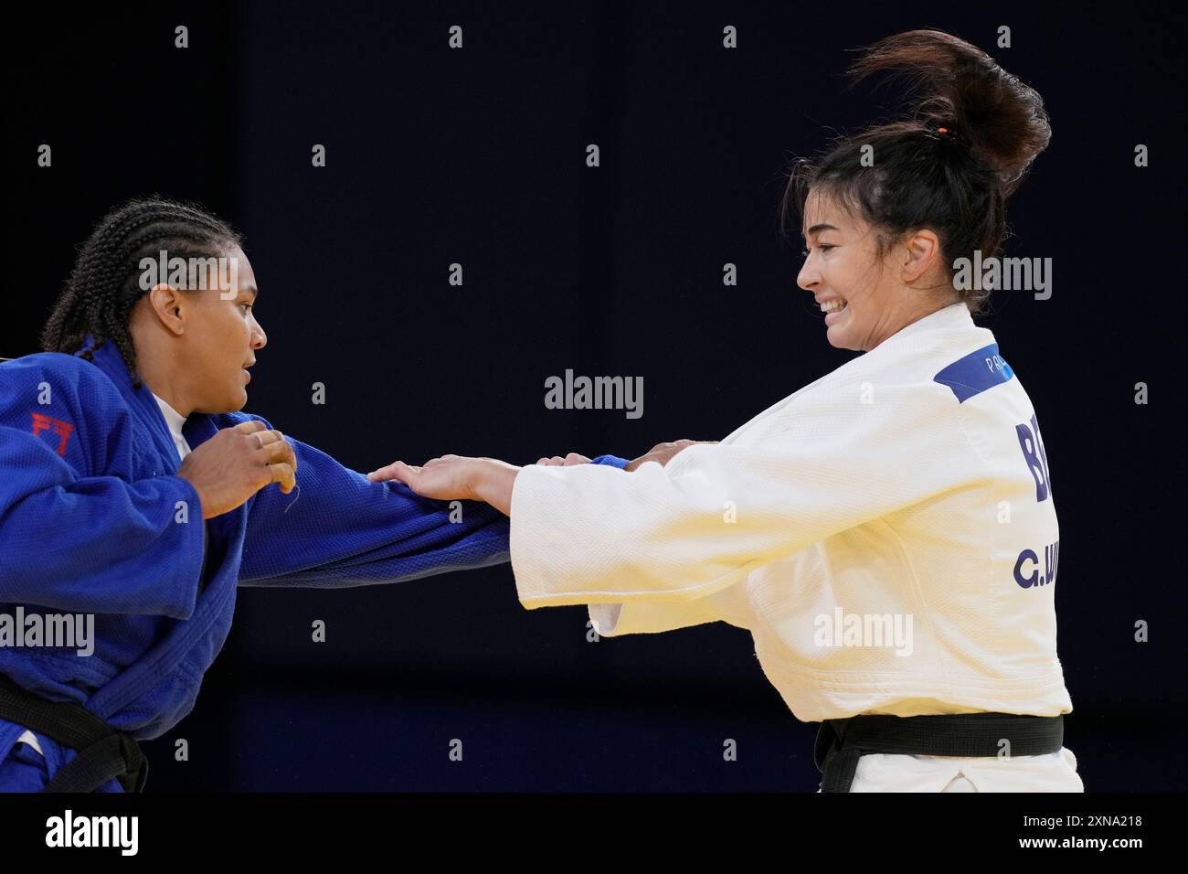 Belgium's Gabriella Willems and Puerto Rico's Maria Perez, left ...