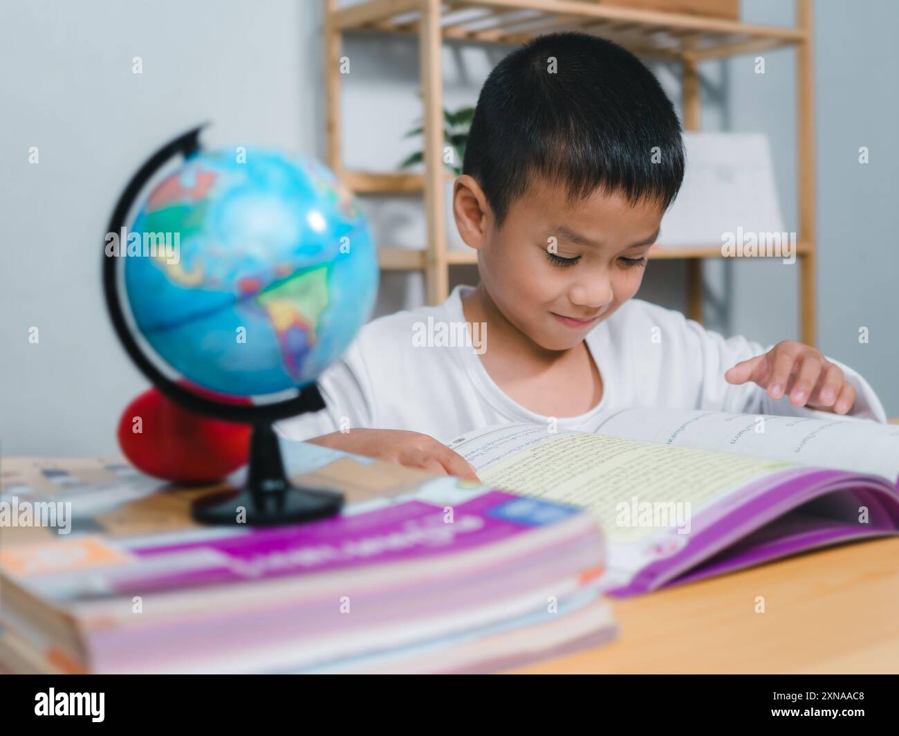 Student learning study reading book while sitting at home. Education ...