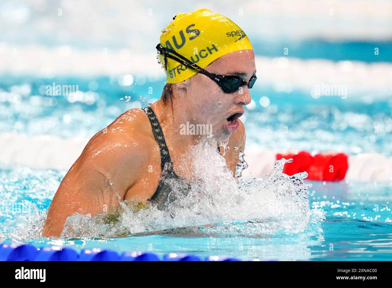 Jenna Strauch, of Australia, competes during a heat in the women's 200 ...