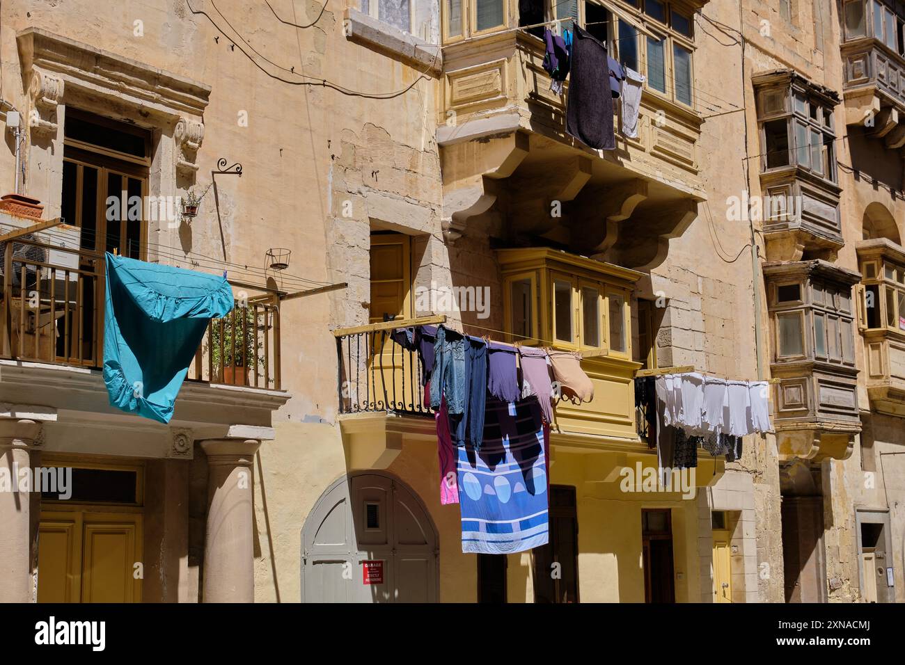Clothes drying on balconies hi-res stock photography and images - Alamy