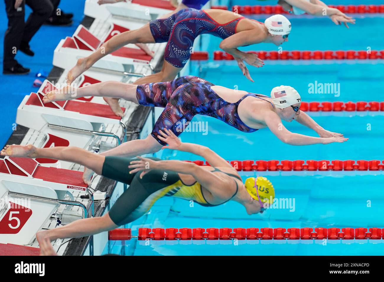 Lilly King, of the United States, competes during a heat in the women's ...