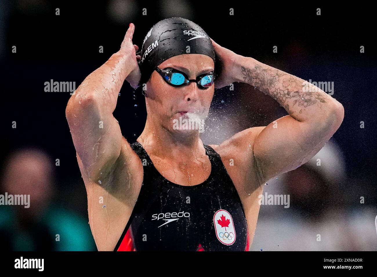 Sydney Pickrem, of Canada, prepares for her heat in the women's 200 ...