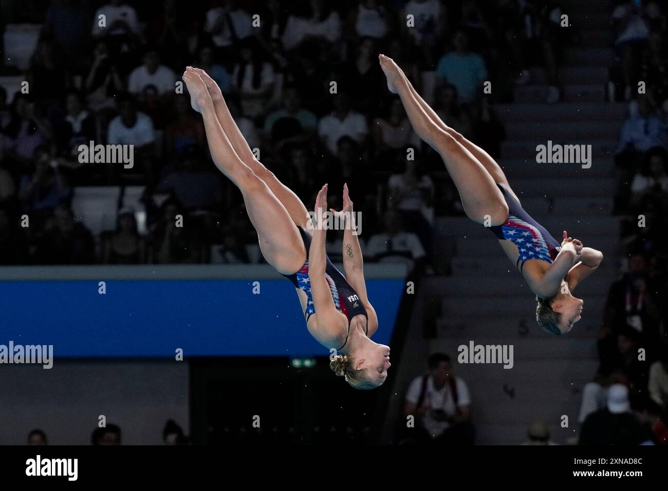 United States' Jessica Parratto and Delaney Schnell compete in the ...