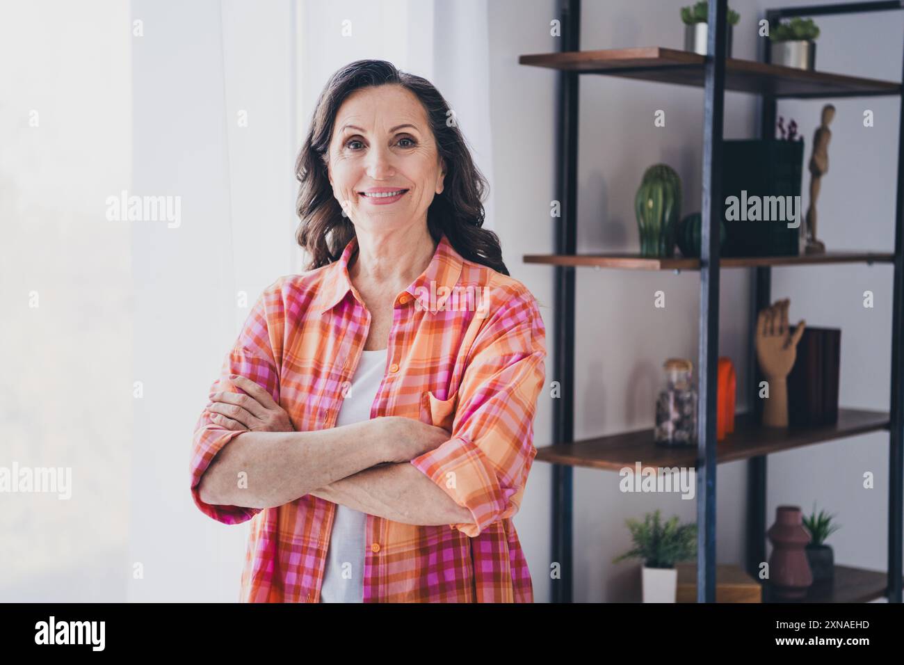 Photo of confident cheerful lady wear plaid shirt smiling arms crossed ...
