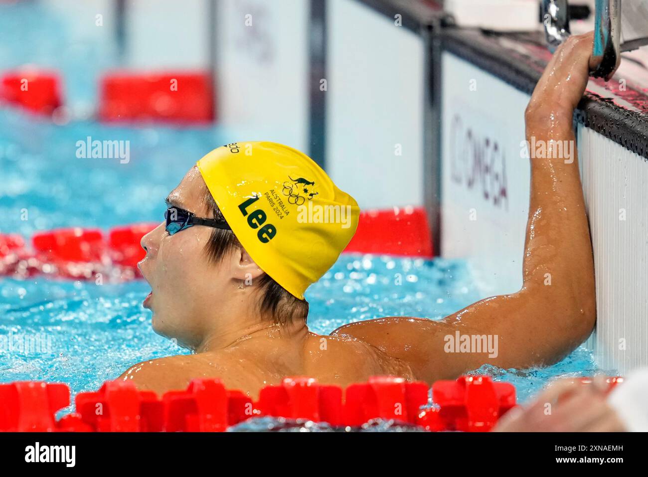 Se-Bom Lee, of Australia, competes during a heat in the men's 200-meter ...