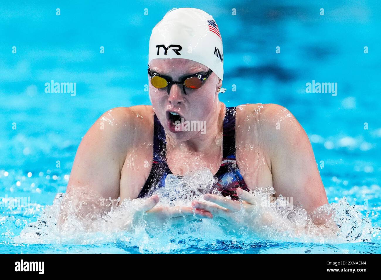 Lilly King, of the United States, competes during a heat in the women's ...
