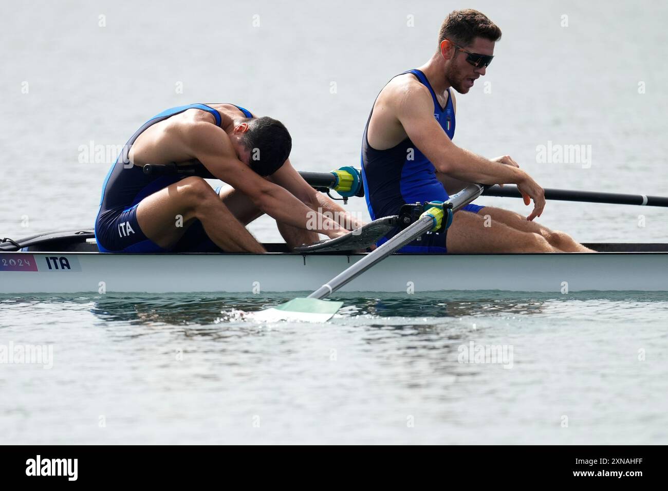 Italy's Giovanni Codato and Davide Comini react at the finish area of ...