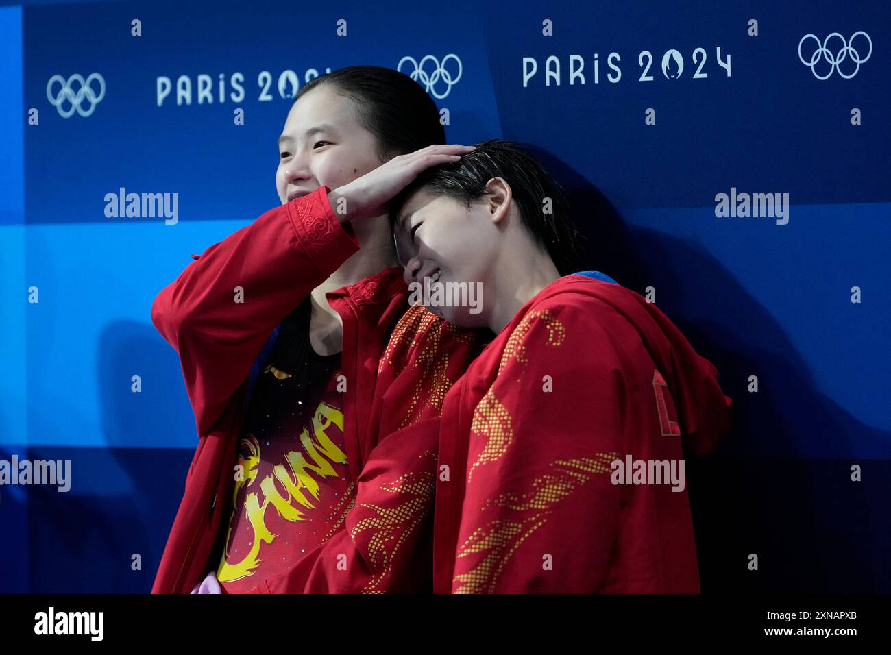 China's Chen Yuxi and Quan Hongchan celebrate after winning the gold ...