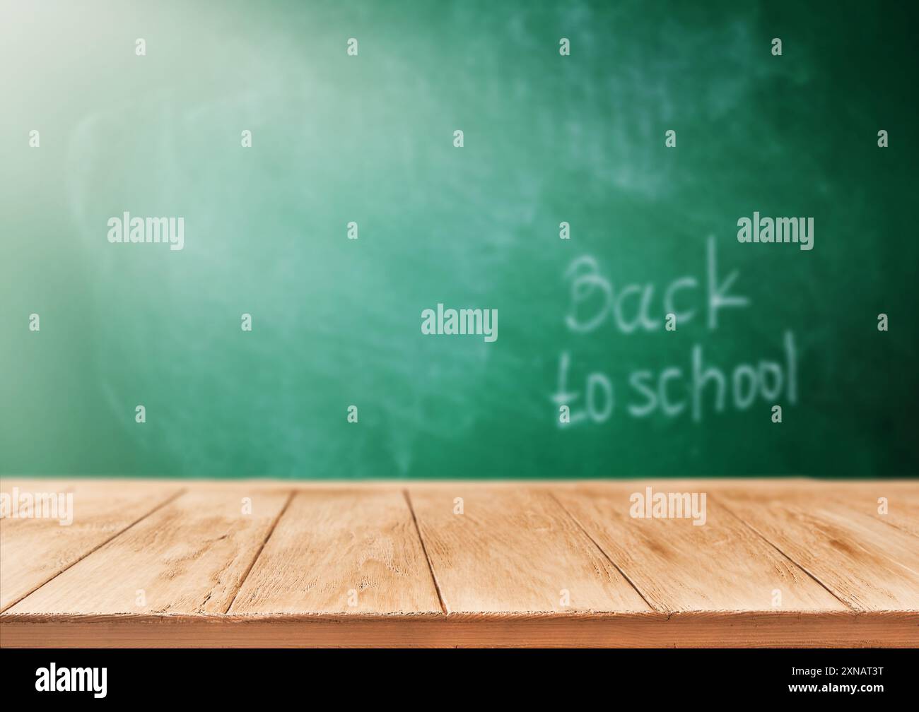 Green blackboard or chalkboard with the inscription back to school and ...