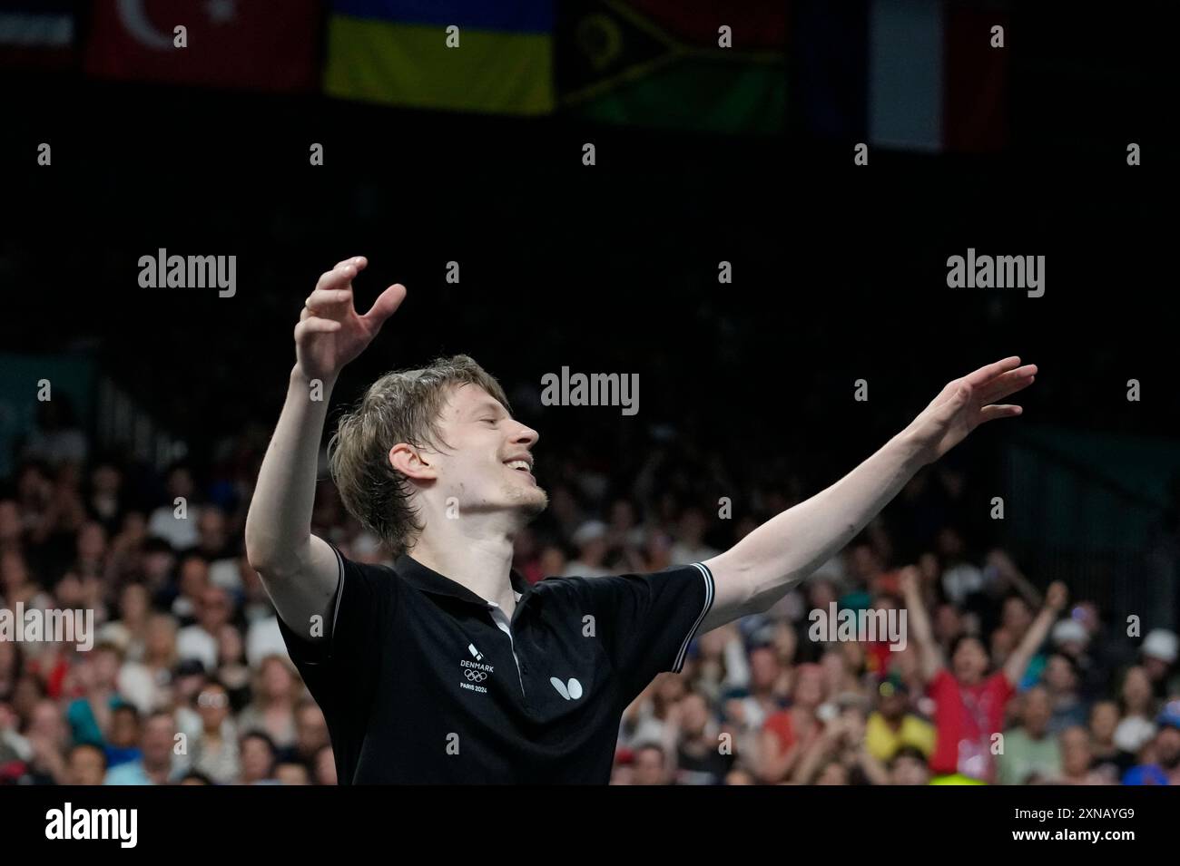 Denmark's Anders Lind celebrates after his win against Poland's Milosz ...