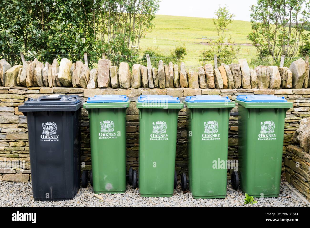 Five wheelie bins from Orkney Islands Council outside a house on Orkney ...