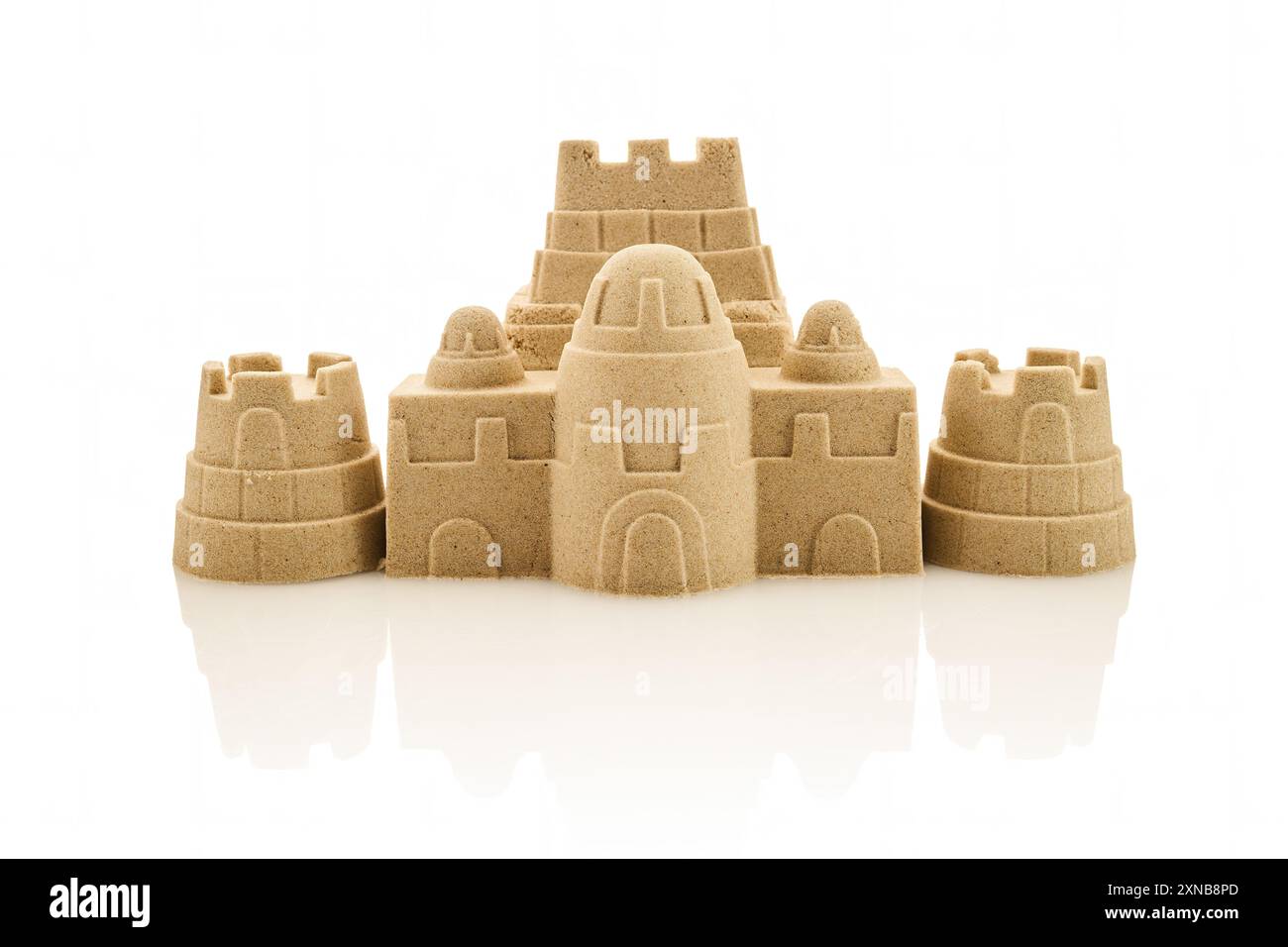 Sandcastle Sculpture A finely detailed sandcastle sculpture on a white ...