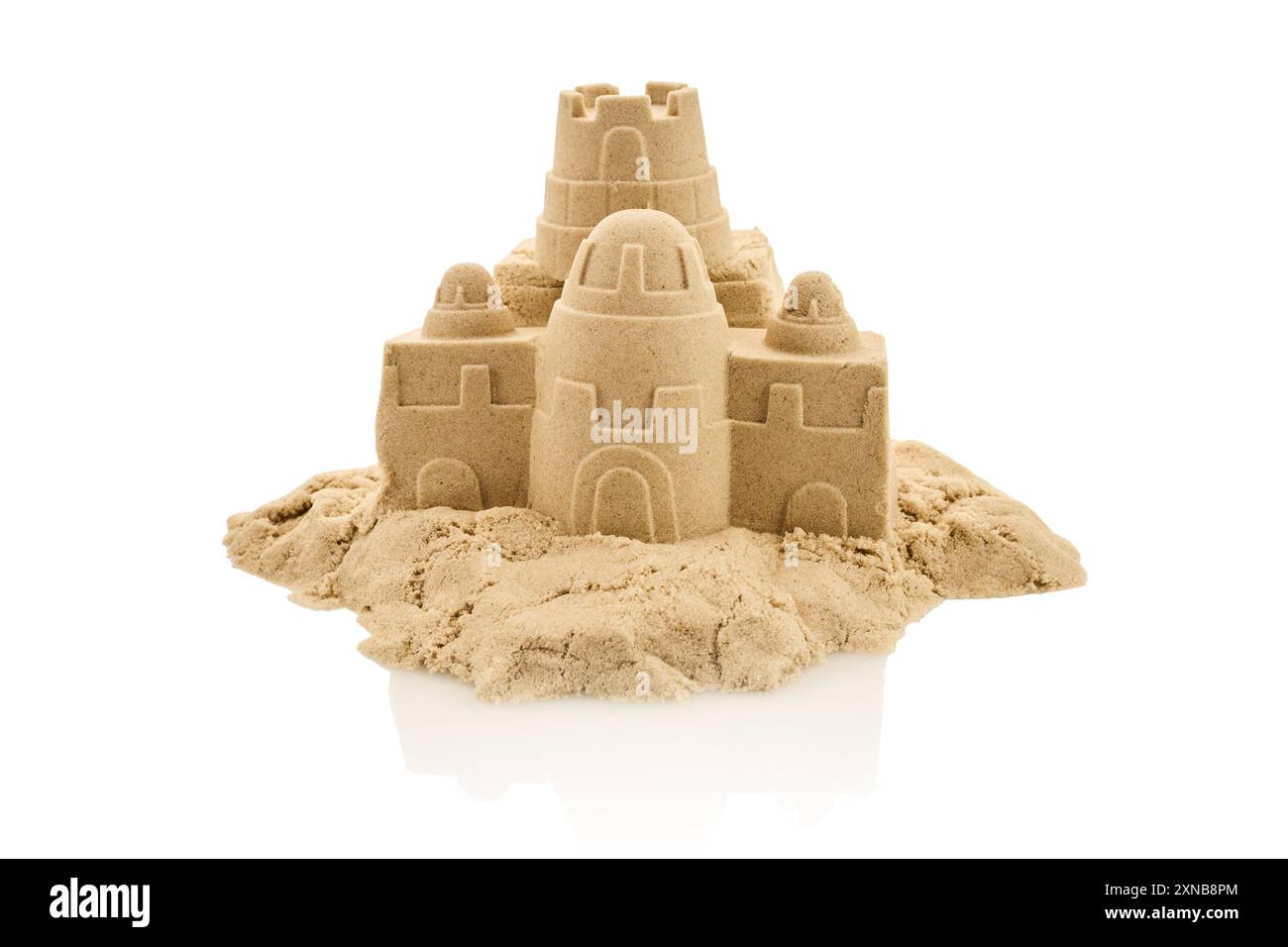 A detailed sandcastle sculpture on a white background Stock Photo - Alamy