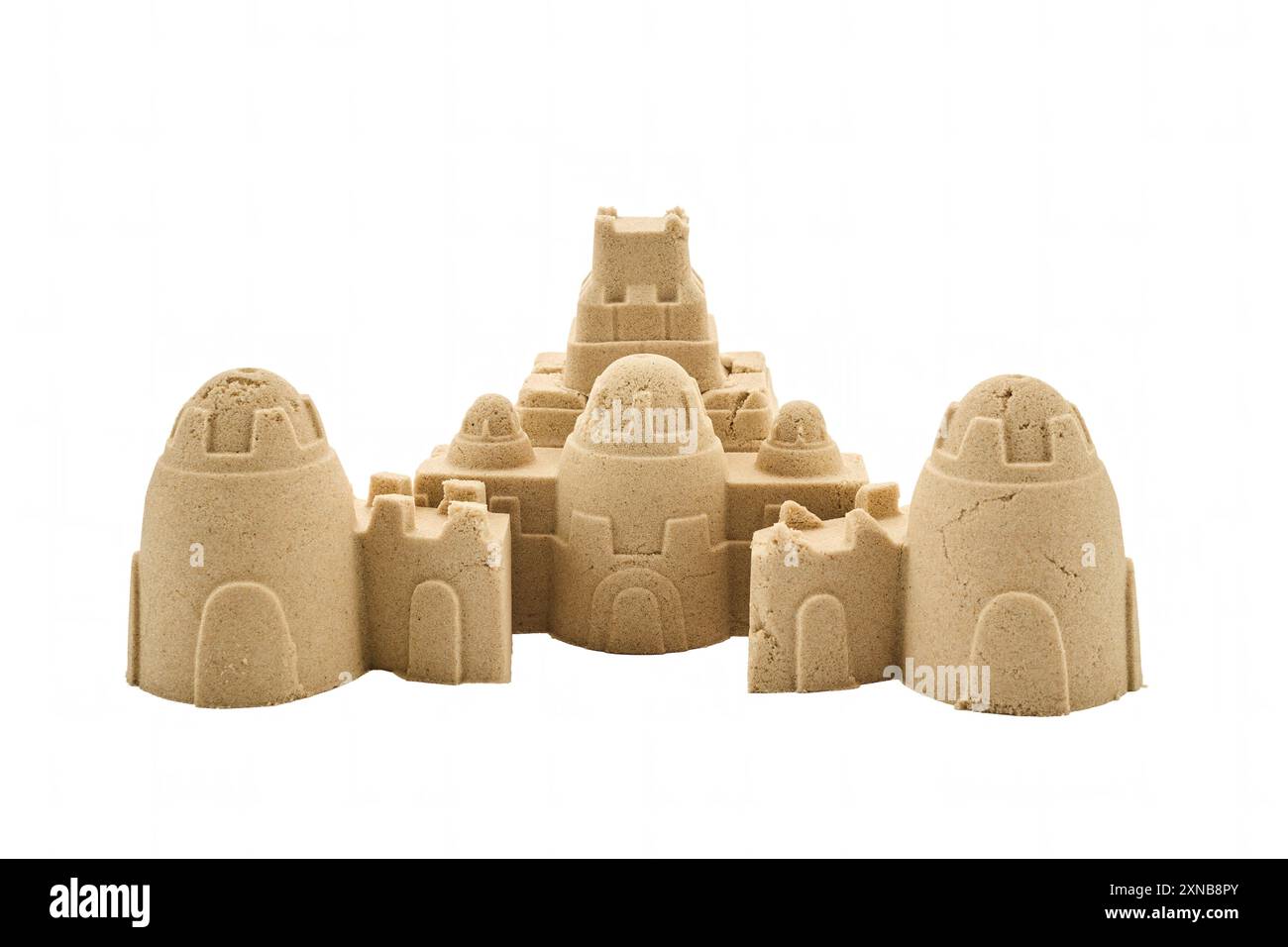 Sandcastle sculpture featuring various towers on a white background ...