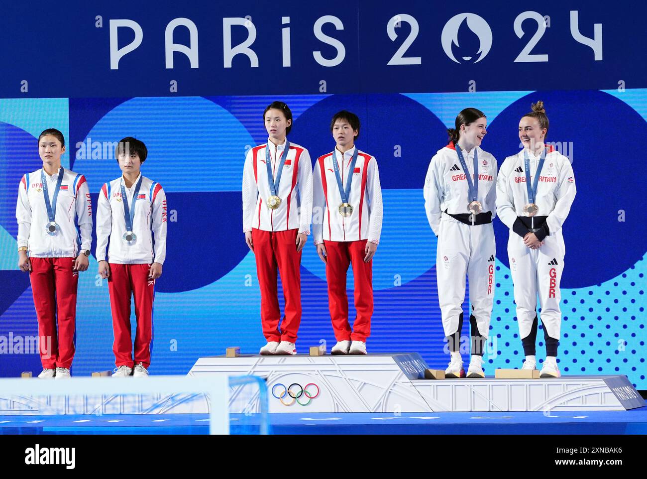 Gold Medalists Chen Yuxi and Quan Hongchan of China (centre), Silver ...
