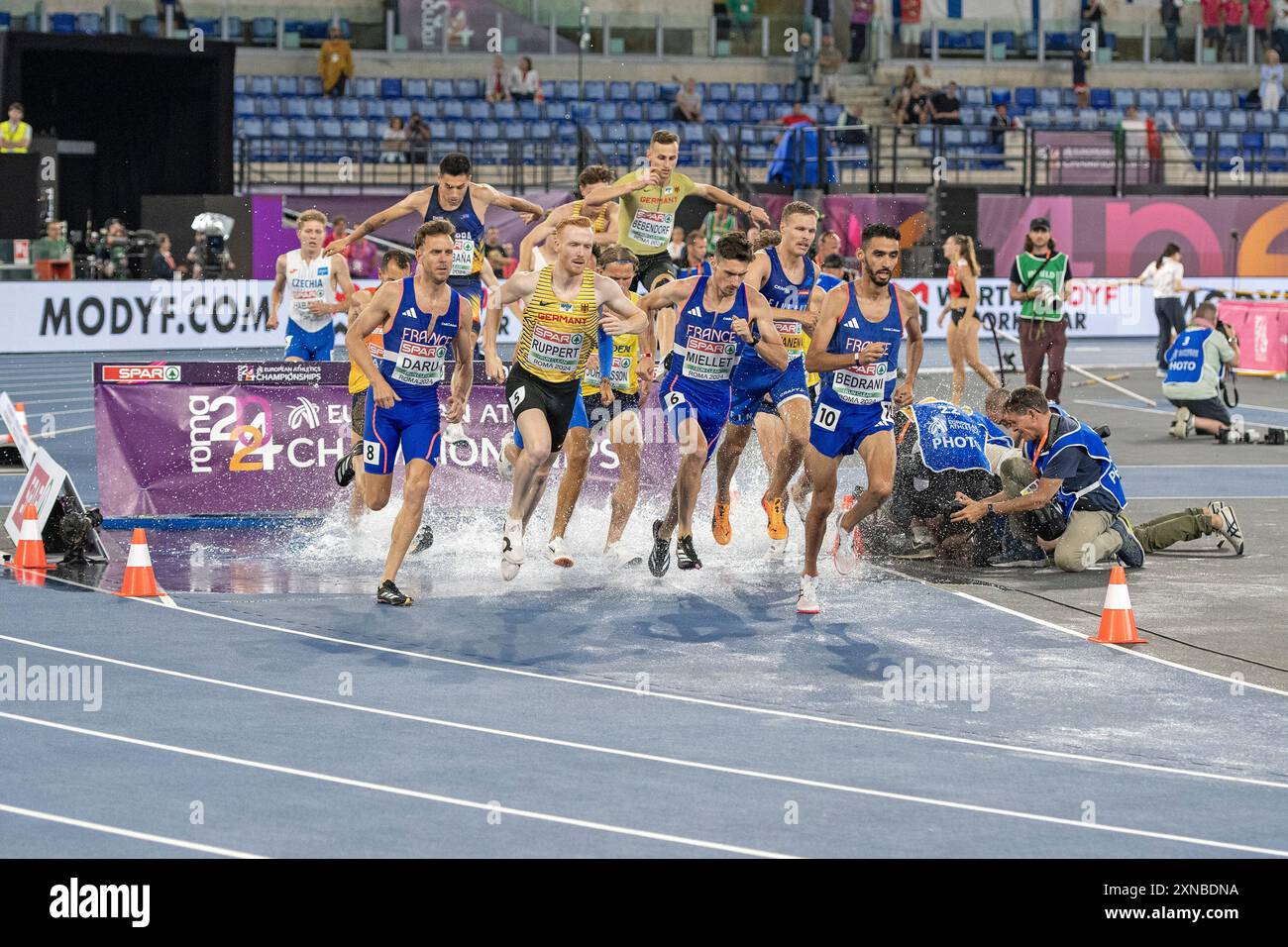 Crossing the barrier with water during the men's 3000m steeplechase final at European Athletics ...