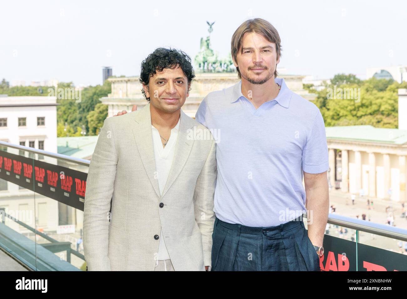 Berlin, Germany. 31st July, 2024. Director M. Night Shyamalan (l) and ...