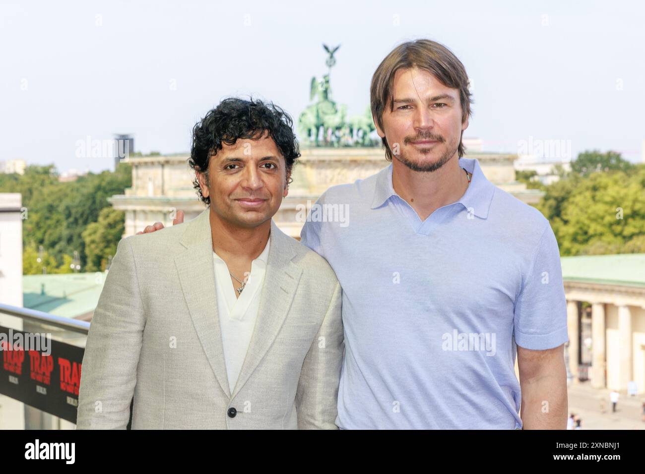 Berlin, Germany. 31st July, 2024. Director M. Night Shyamalan (l) and ...