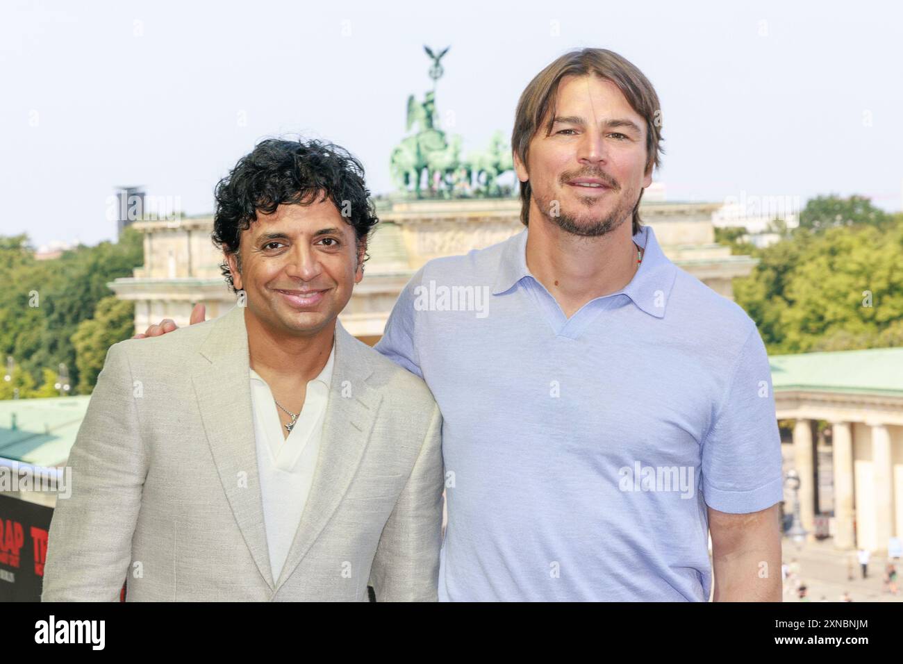 Berlin, Germany. 31st July, 2024. Director M. Night Shyamalan (l) and ...