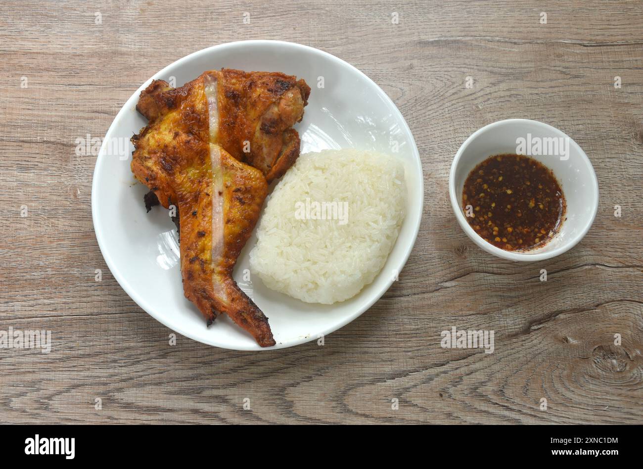 roasted chicken wing eat couple sticky rice on plate dipping with spicy ...