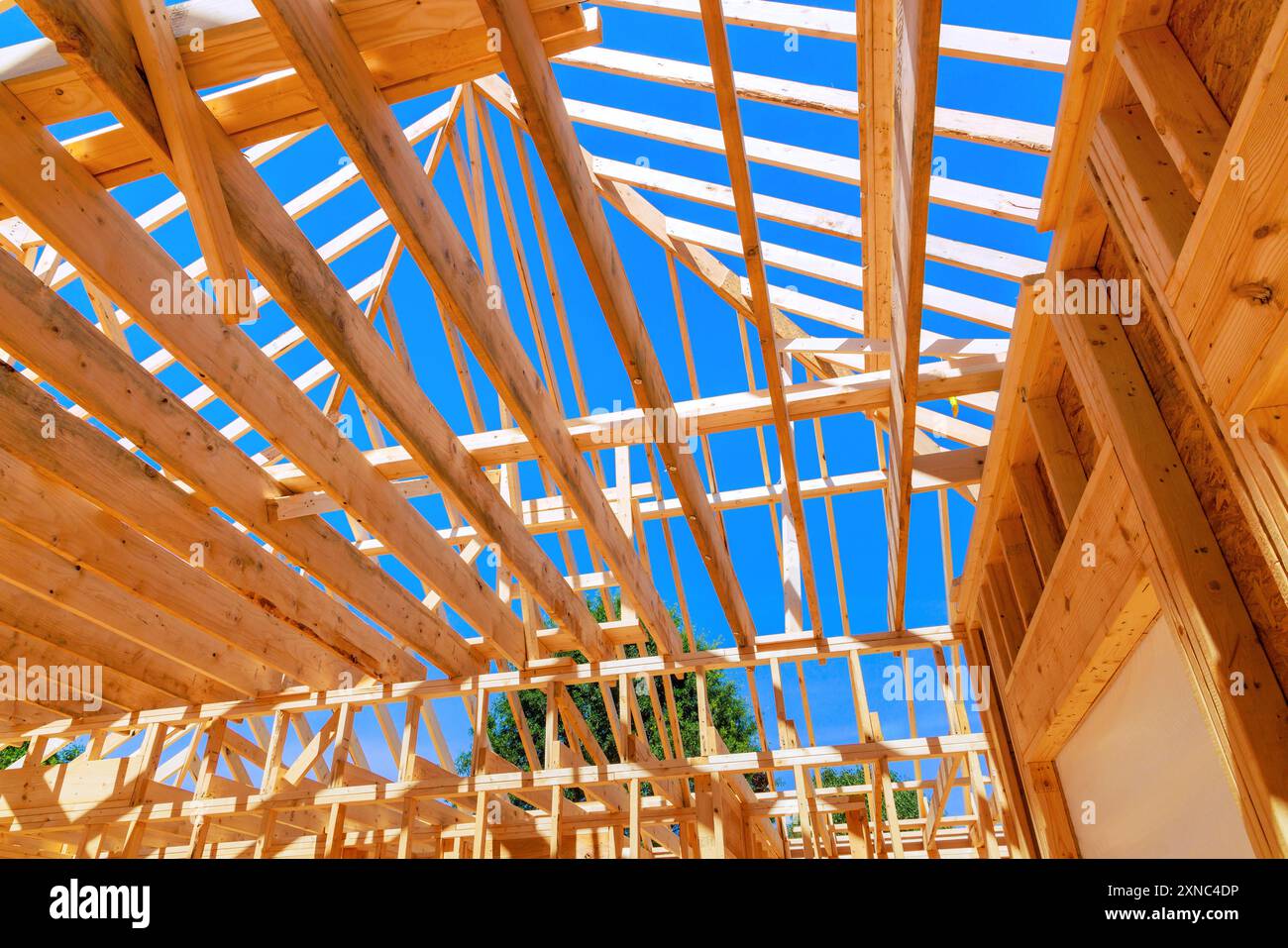 Construction is under way on new timber truss framed home with roof ...