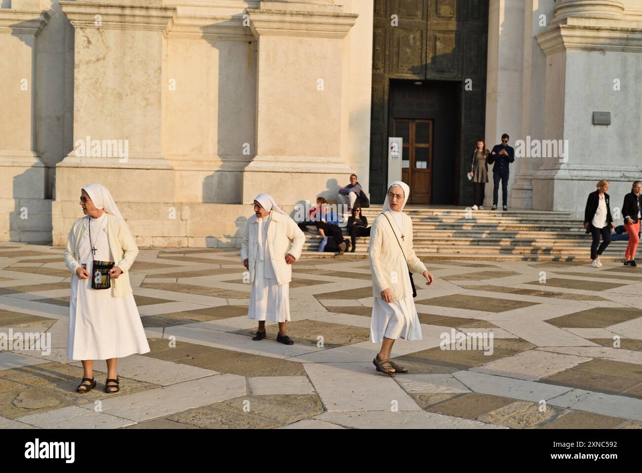Three nuns crossing the plaza in front of the Palladio designed ...