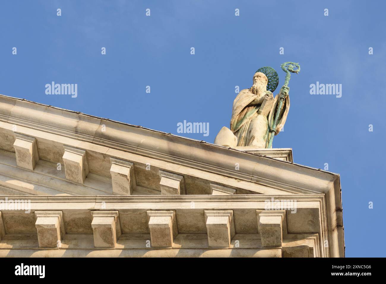 Statue of Saint Stephen on the pediment, front roof of San Giorgio ...