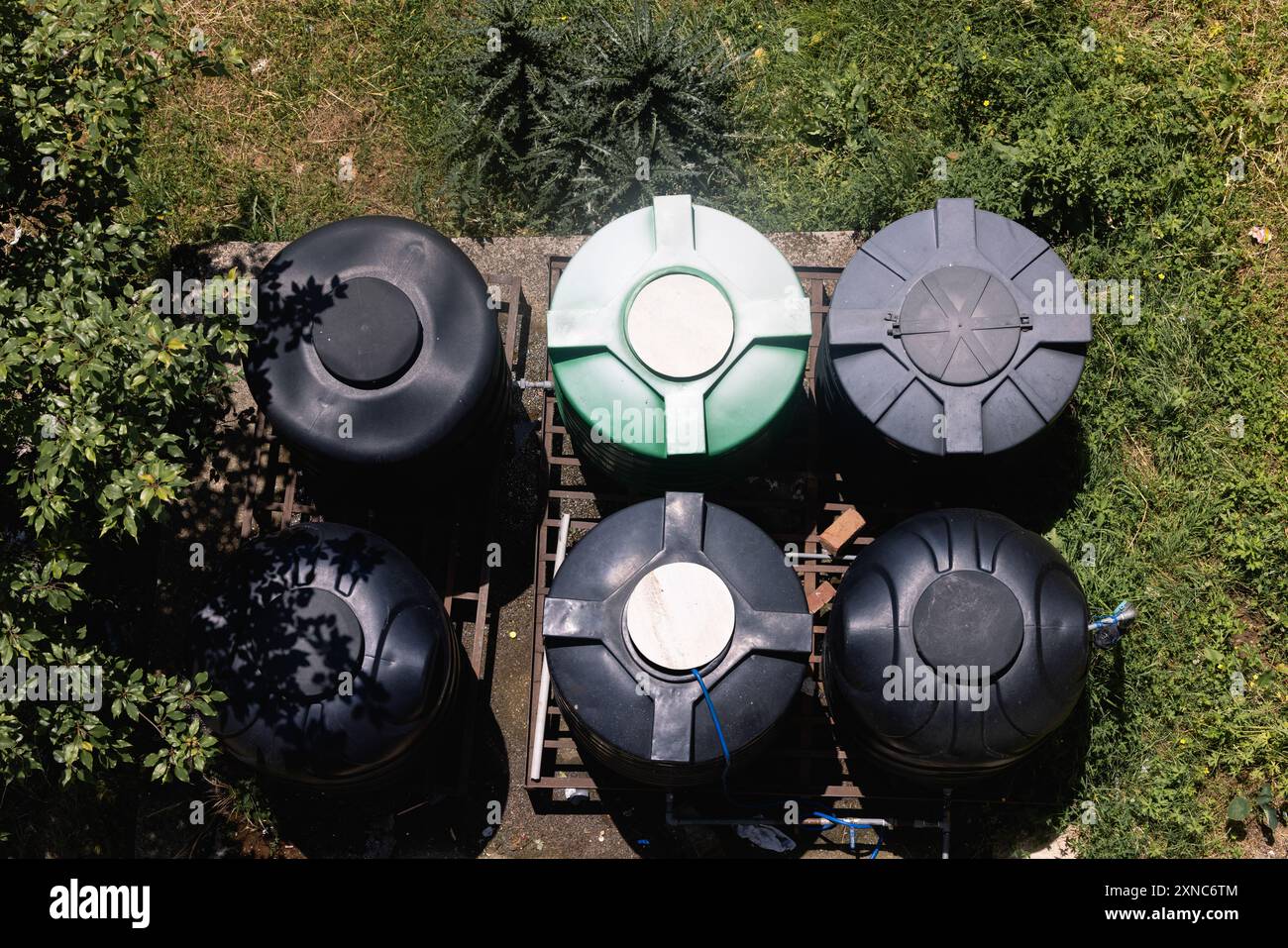 rooftop tanks for collecting and using water in a residential building ...