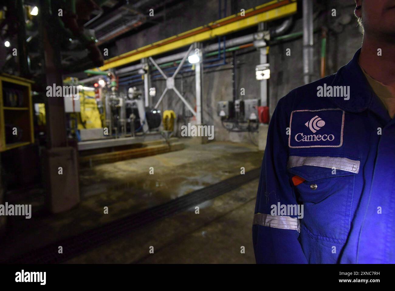 A Cameco employee is shown during a Cameco media tour of the uranium ...
