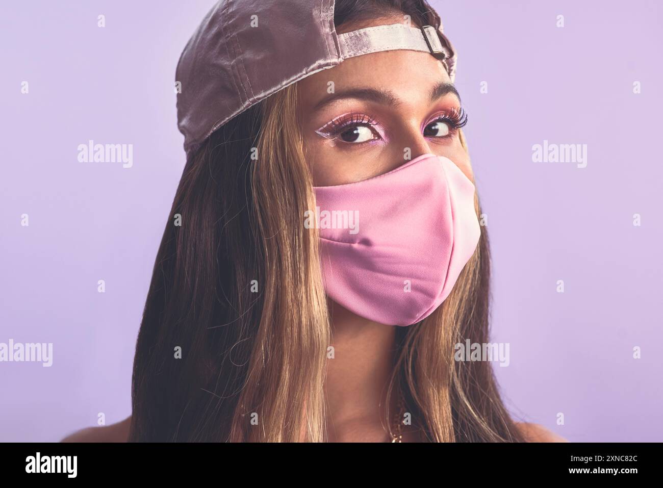 Woman, fashion portrait and mask in studio with style inspiration ...