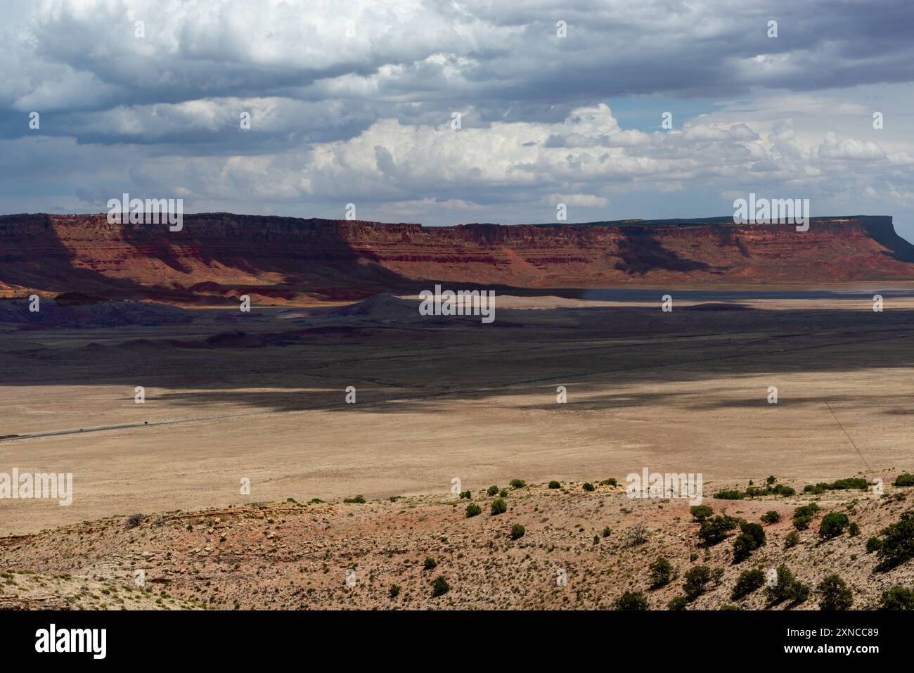 Thick clouds, shadows over Vermillion Cliffs, empty expanse of high ...