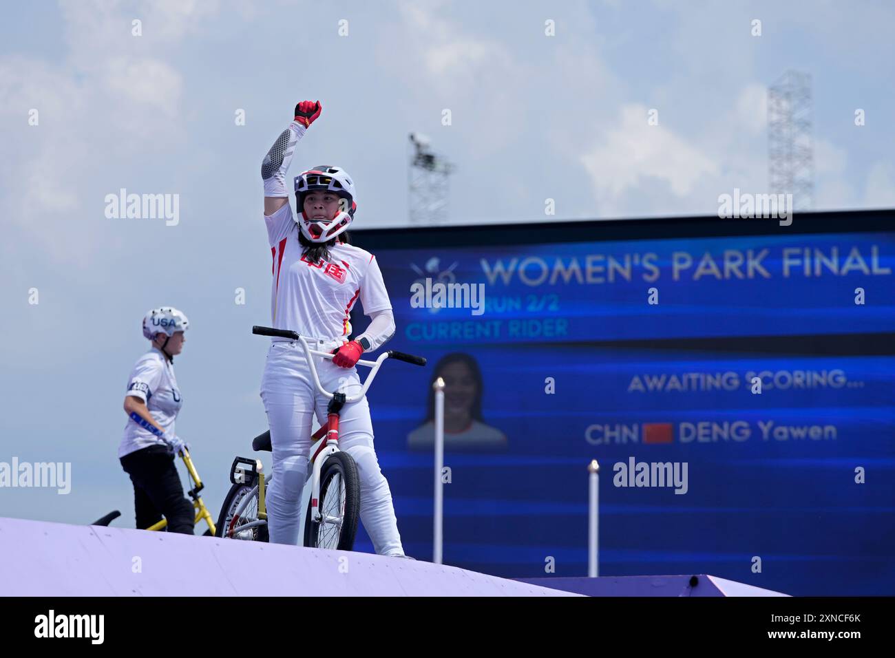Deng Yawen, of China, celebrates after finishing her second run, while ...