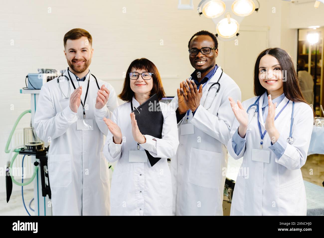 Group of doctors standing together Stock Photo - Alamy