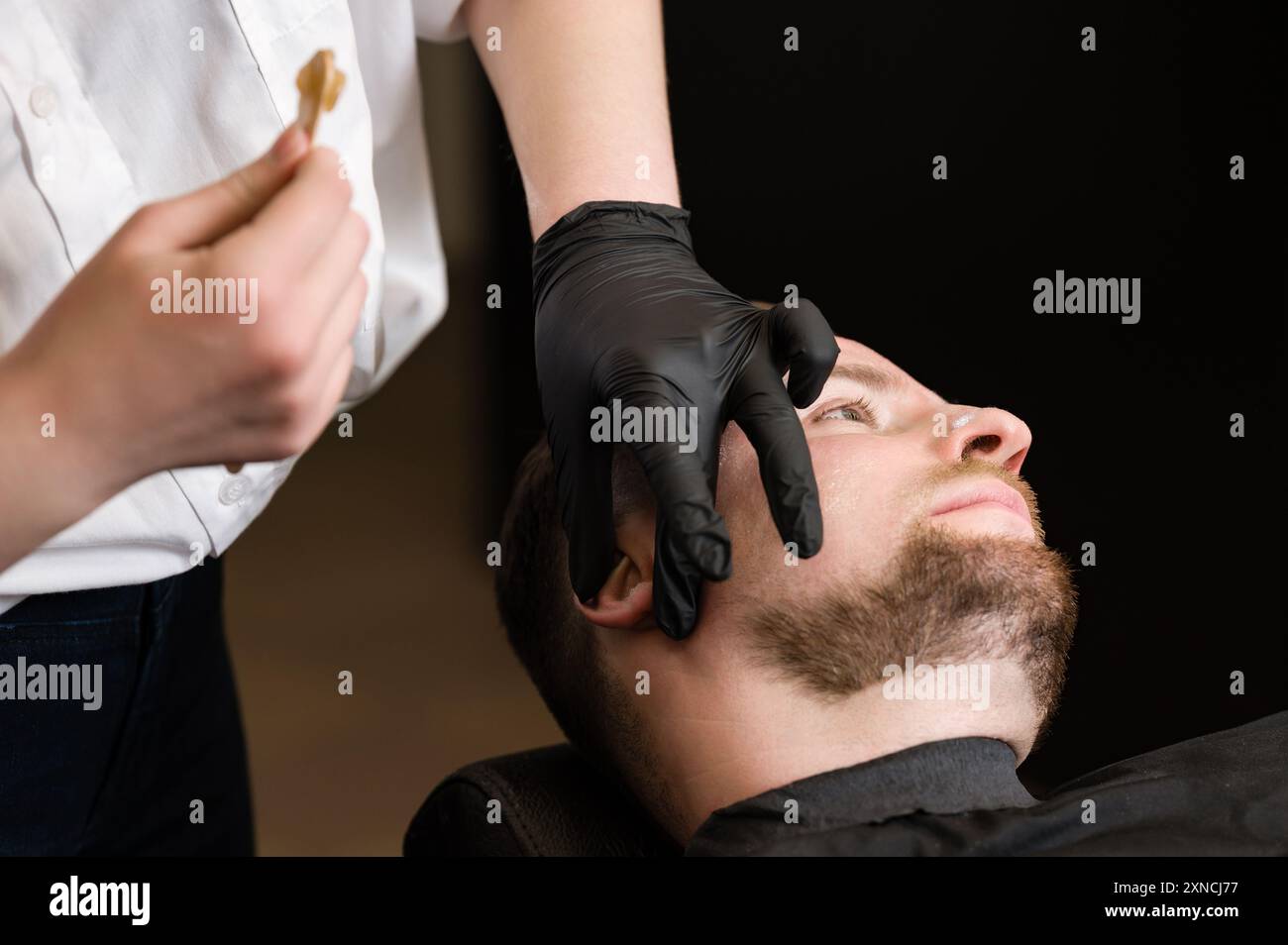 Hair in the ear canal hi-res stock photography and images - Alamy