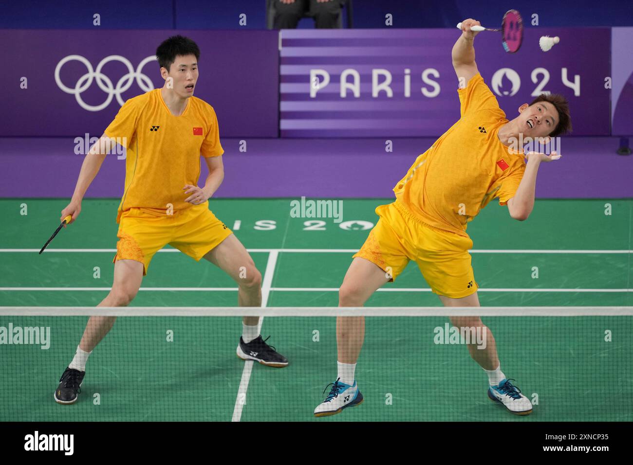 China's Liu Yu Chen and Ou Xuan Yi play against Taiwan's Lee Yang and ...