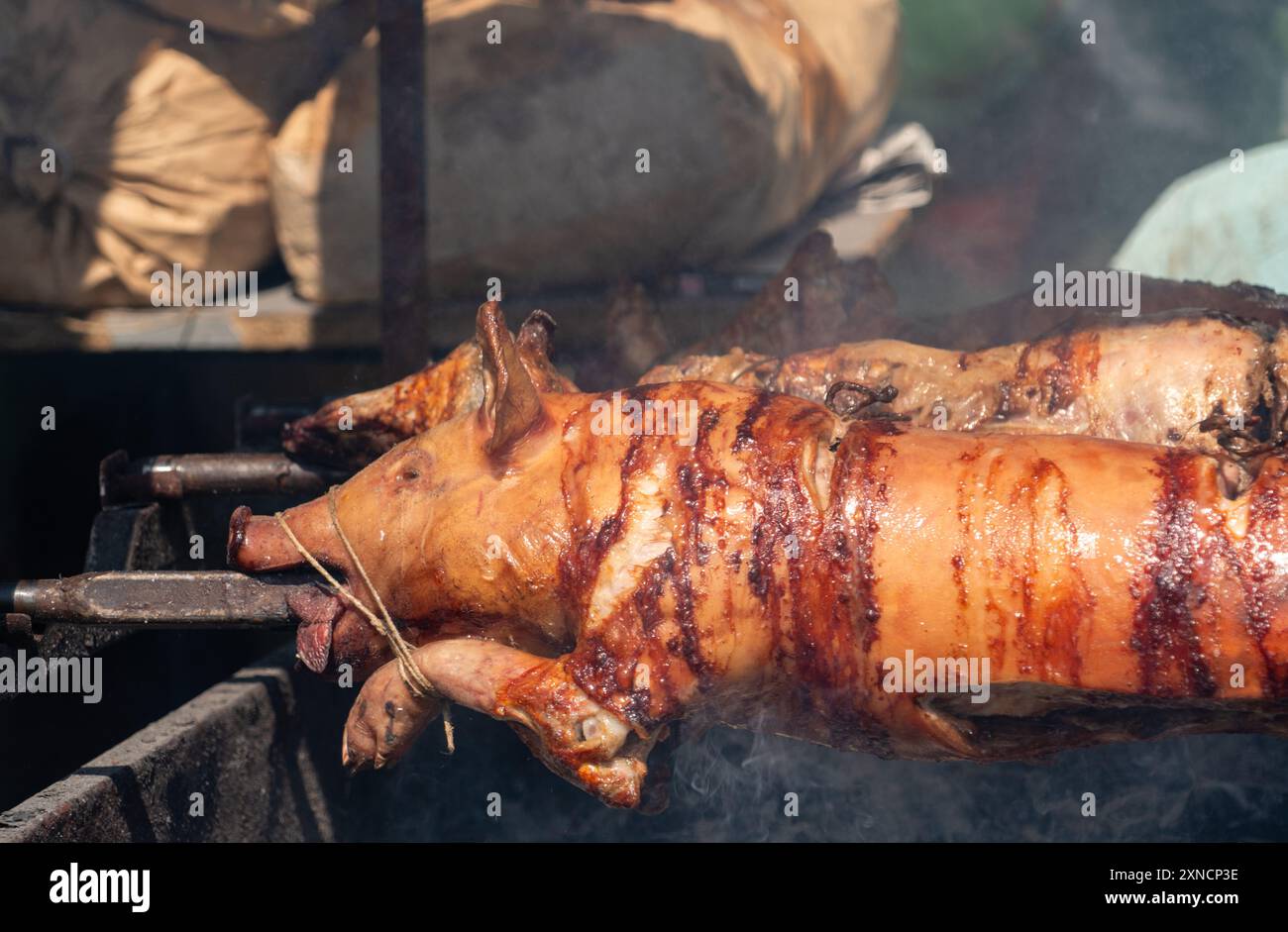 Cooking on spit hi-res stock photography and images - Alamy