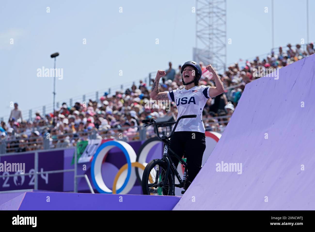 Perris Benegas, of the United States, celebrates after finishing her ...