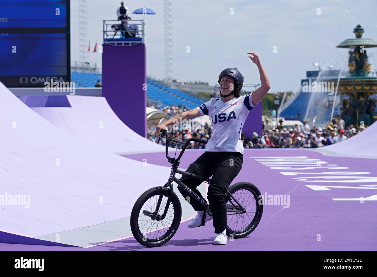 Perris Benegas, of the United States, celebrates after finishing her ...