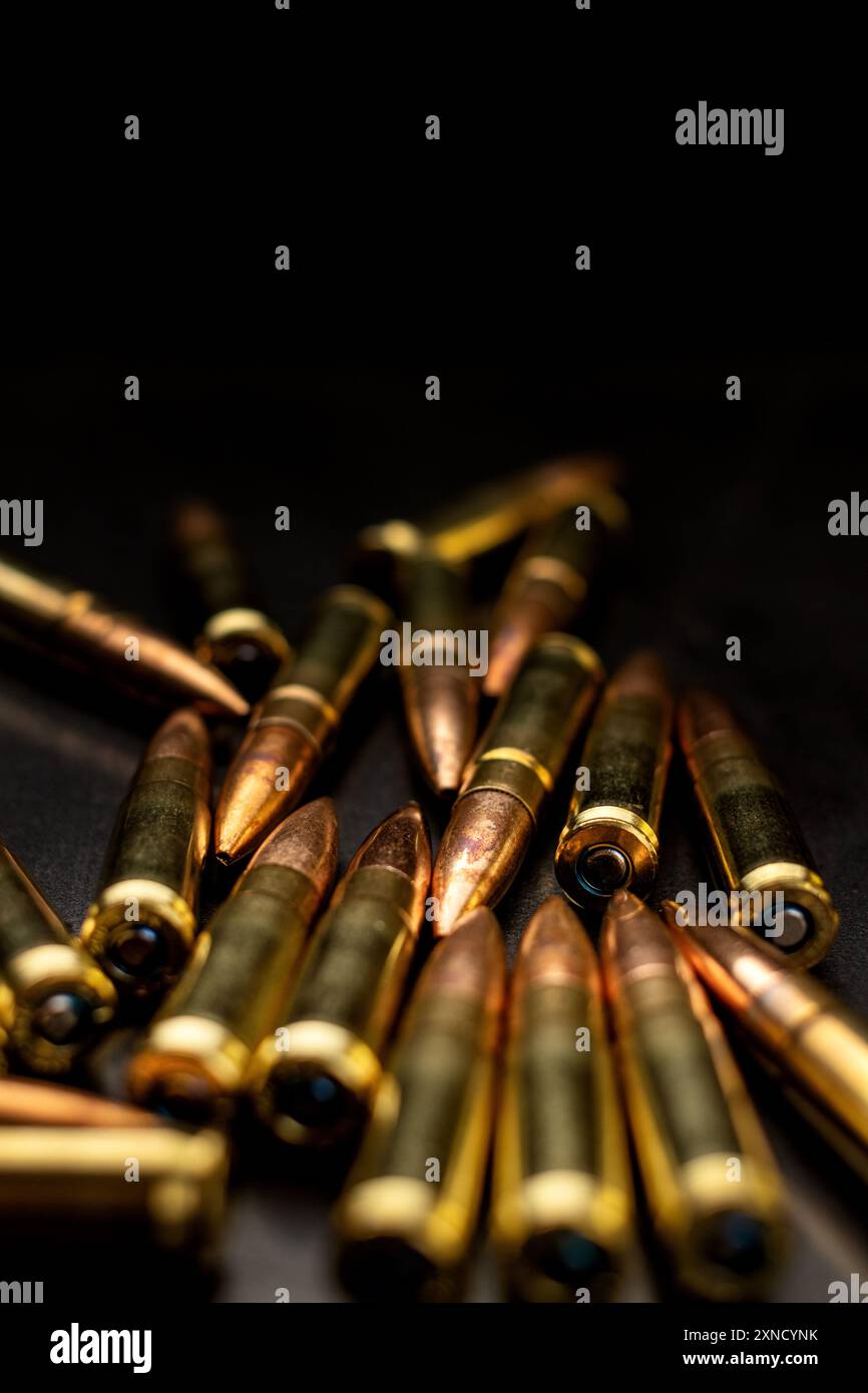 Bullet on black background. Rifle bullets close-up on black back ...