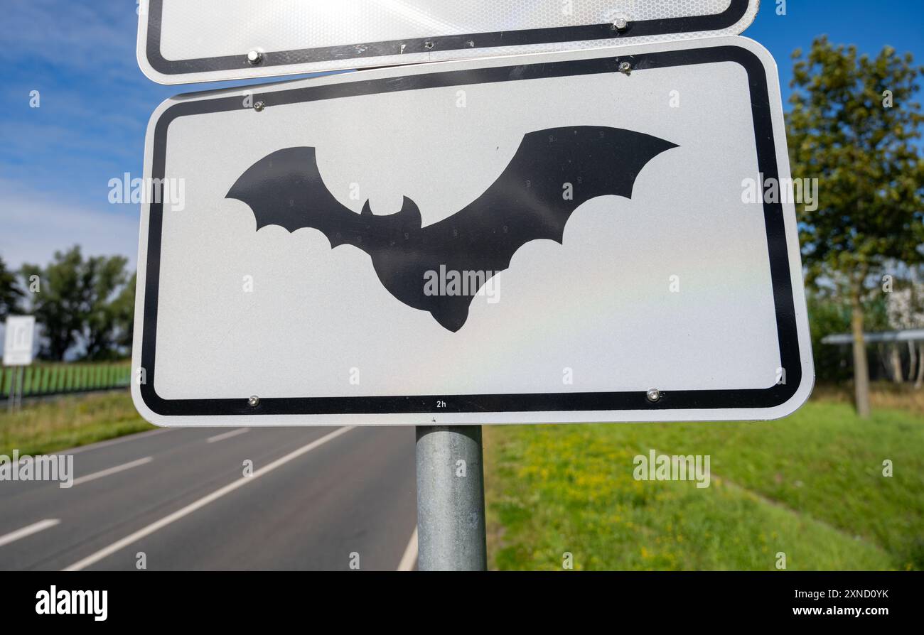 Bergen, Germany. 22nd July, 2024. Traffic signs warn against the flight ...
