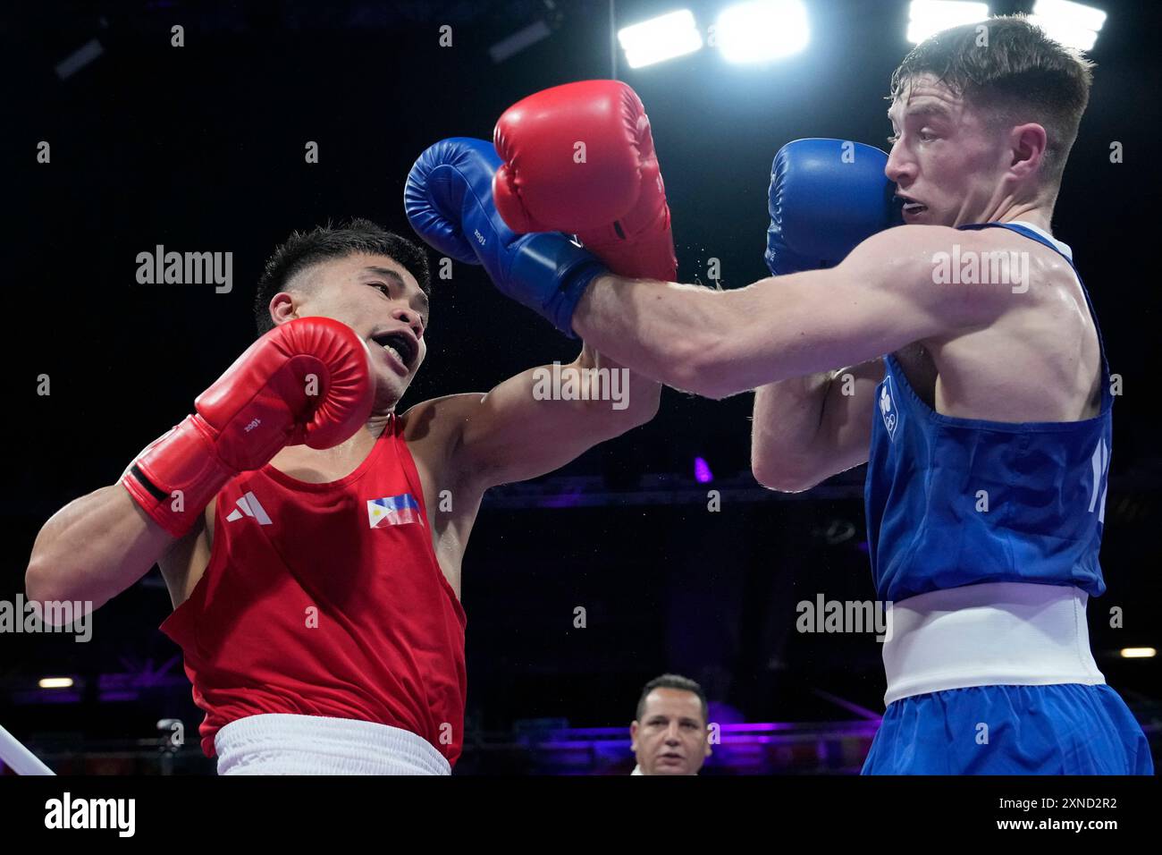 Philippines' Carlo Paalam, left, fights Ireland's Jude Gallagher in ...