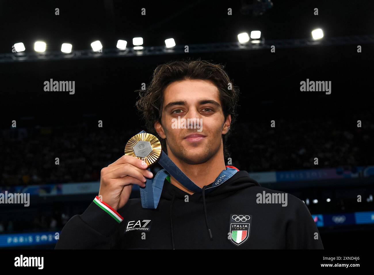 Thomas Ceccon of Italy attends the medal ceremony of the 100m ...