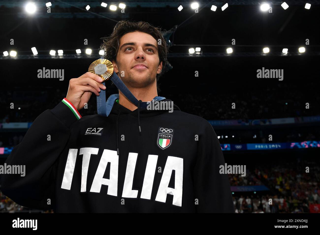 Thomas Ceccon of Italy attends the medal ceremony of the 100m ...