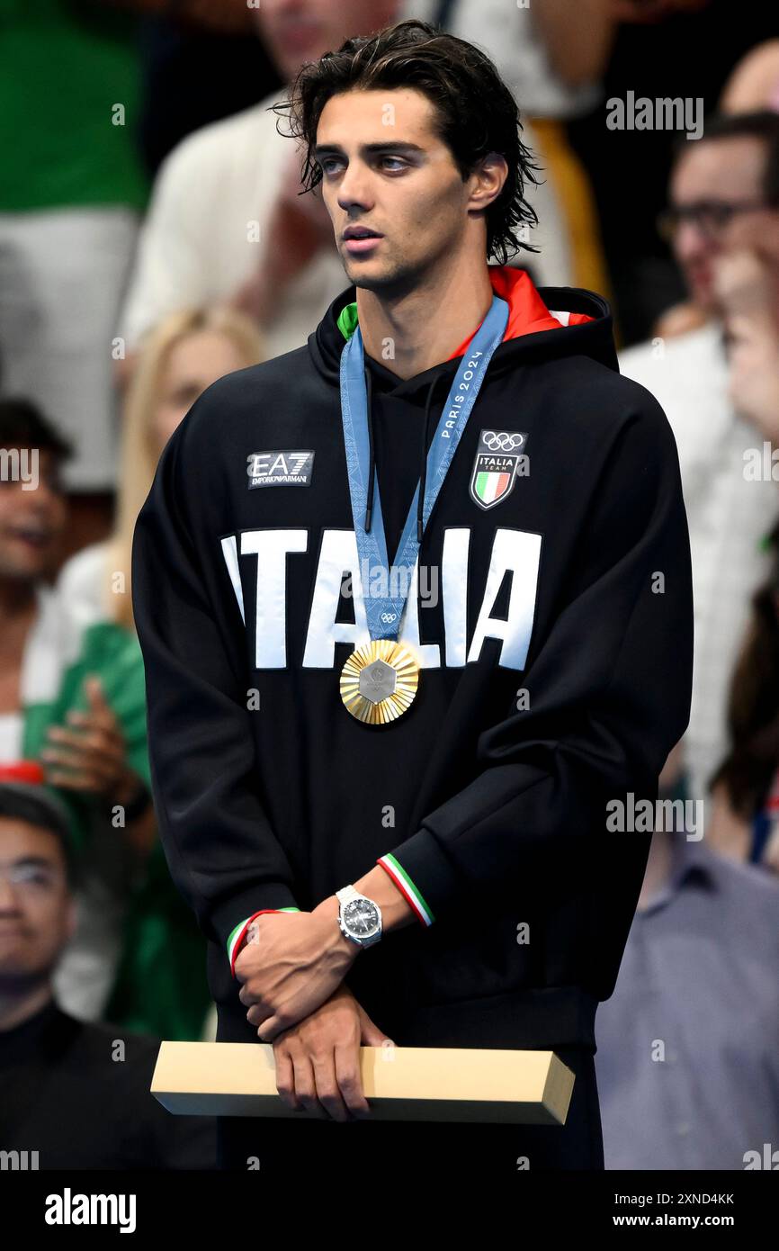 Thomas Ceccon of Italy attends the medal ceremony of the 100m ...