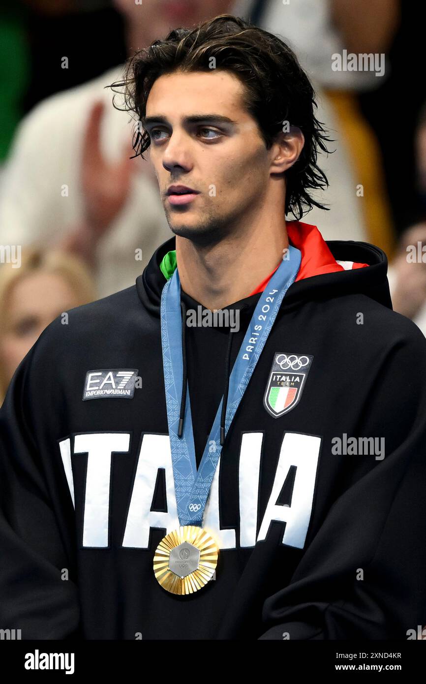 Thomas Ceccon of Italy attends the medal ceremony of the 100m ...