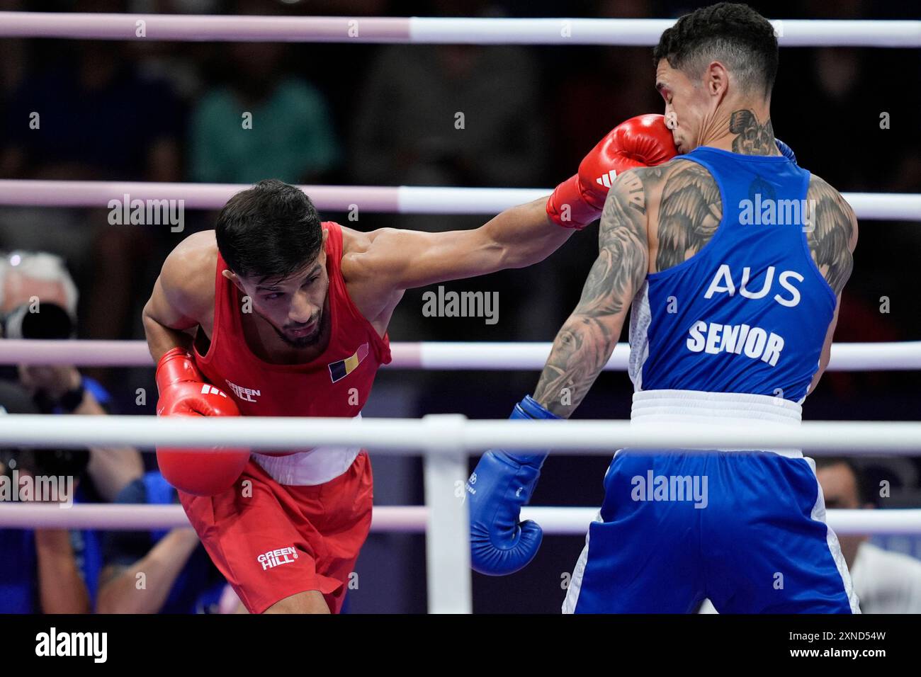 Belgium's Vasile Usturoi hits Australia's Charlie Senior in their men's ...