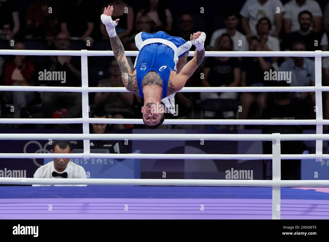 Australia's Charlie Senior celebrates with a backflip after defeating ...