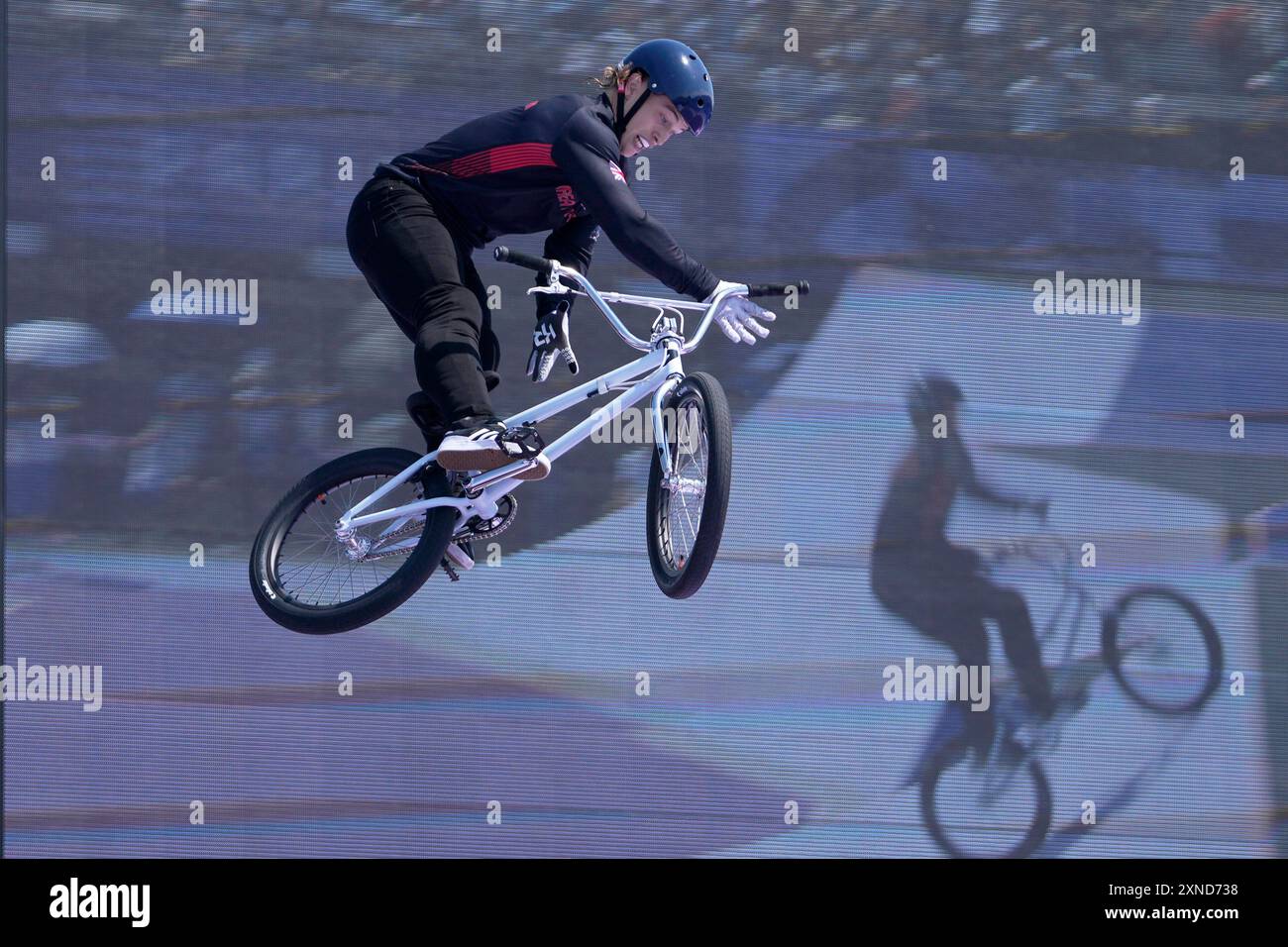 Kieran Darren David Reilly, of Britain, performs a trick in front of a ...
