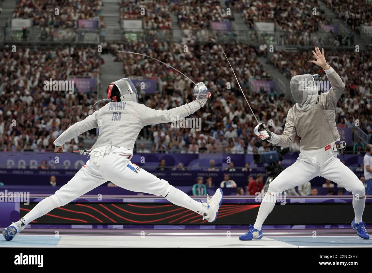 France's Bolade Apithy, left, competes with South Korea's Gu Bongil in ...